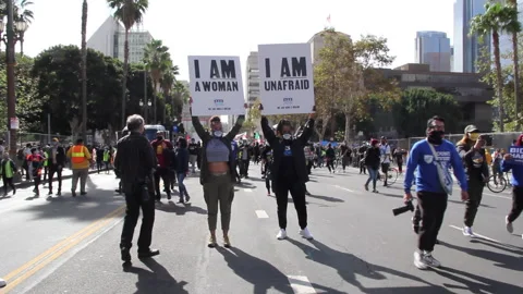 Women With Signs Stock Videos – Royalty-Free HD & 4K Videos | Pond5