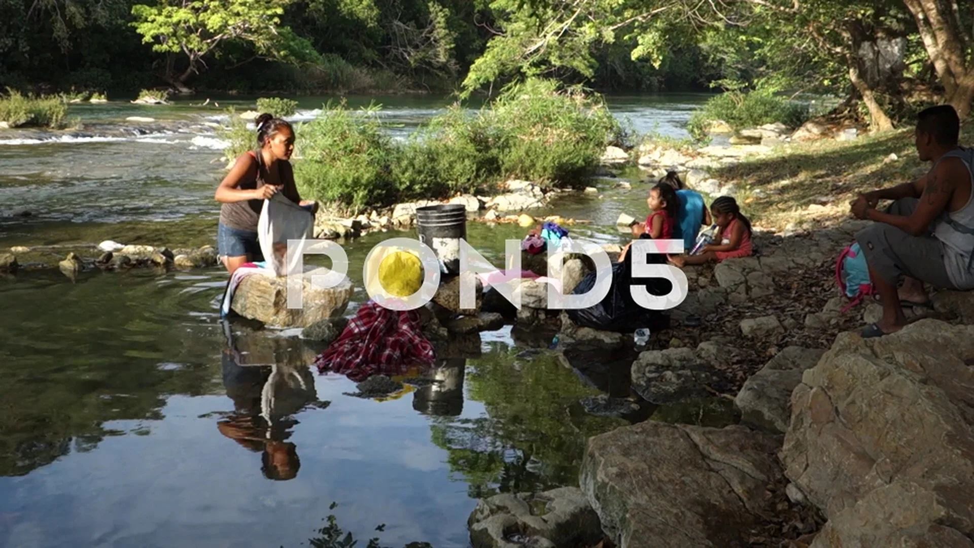 Washing Clothes At The River
