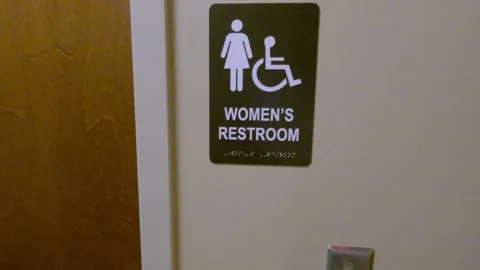 Women's restroom sign with handicap symb... | Stock Video | Pond5