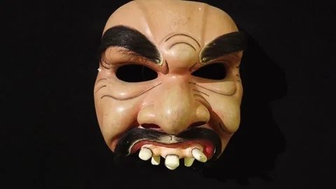 Wood Carved Mask of Angry Character Shou... | Stock Video | Pond5