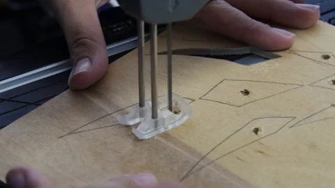 Wood Master cut out of wood shapes | Stock Video | Pond5