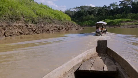 Wooden boats sail on Purus River in the ... | Stock Video | Pond5