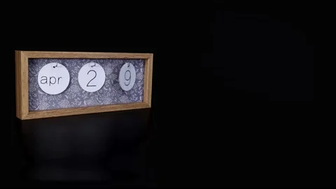 A wooden calendar block showing the date... | Stock Video | Pond5