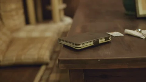 Wooden desk, E-ink reader | Stock Video | Pond5