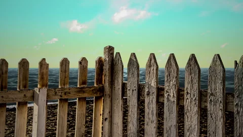Wooden Fence Ocean Waves Sunny Day Motio... | Stock Video | Pond5