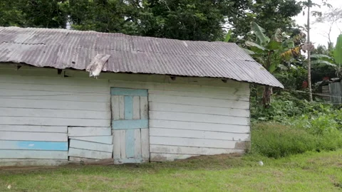 Wooden house without windows in an Afric... | Stock Video | Pond5