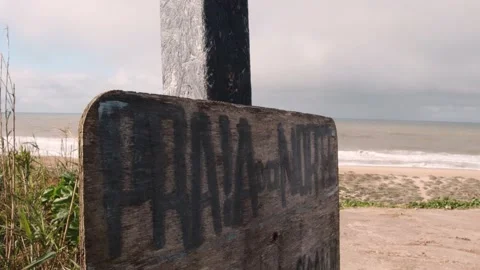 Wooden sign on sandy beach with North Be... | Stock Video | Pond5