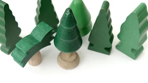 Wooden toy trees isolated on white backg... | Stock Video | Pond5