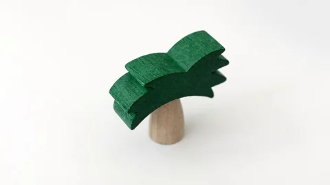 Wooden toy trees isolated on white backg... | Stock Video | Pond5