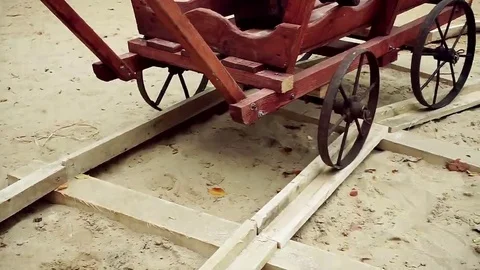 Wooden wagon rolling on rails made from ... | Stock Video | Pond5