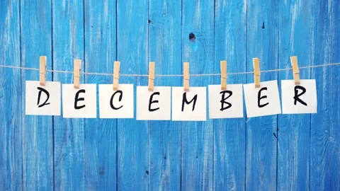 Word December. Letters on cards on a woo... | Stock Video | Pond5
