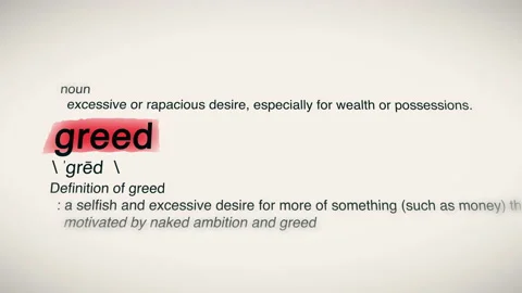 The Word Greed Red Highlighted in a Dict... | Stock Video | Pond5