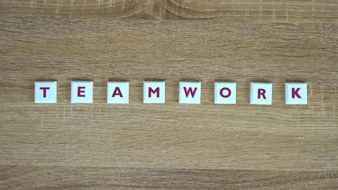 Word "Teamwork" is made of letters on wo... | Stock Video | Pond5