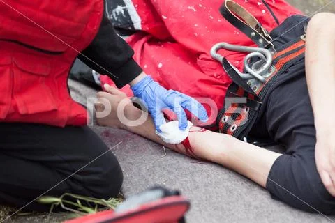 Work accident. First aid training. Arm injury. Stock Photo #125181465