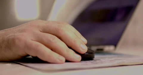 Work on a laptop. Use a computer mouse. ... | Stock Video | Pond5