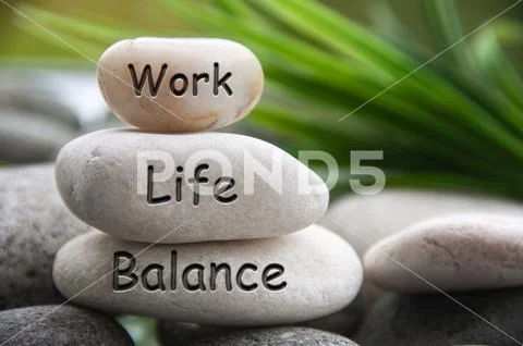 Work life balance text engraved on white stones. Work, lifestyle and ...