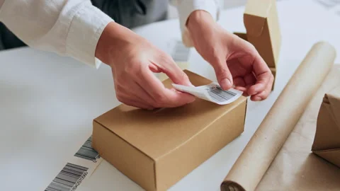 The work process of a parcel packer in a... | Stock Video | Pond5