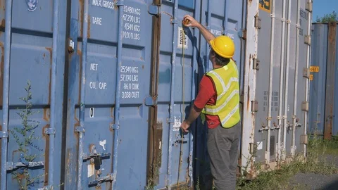 Worker Measuring a Shipping Container Bo... | Stock Video | Pond5