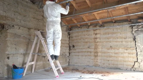 Worker in PPE Suit Checking Woodframe fo... | Stock Video | Pond5