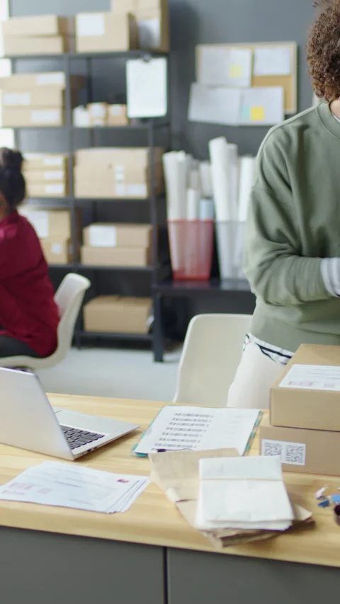 Worker Scanning Parcels in Delivery Serv... | Stock Video | Pond5