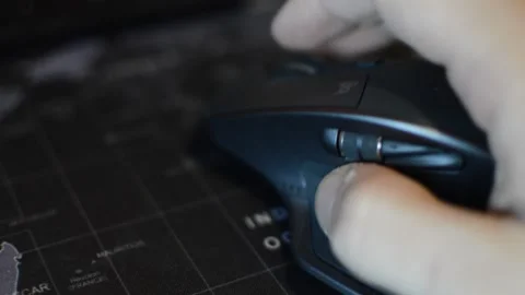 worker use mouse. using ergonomic mouse ... | Stock Video | Pond5