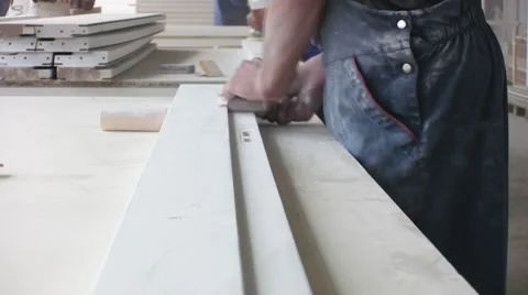 Worker using a power sander to smooth pa... | Stock Video | Pond5