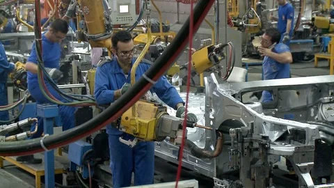 Workers at cars' assembly line inside Kh... | Stock Video | Pond5