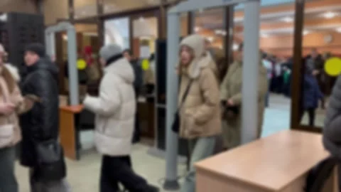 Workers leave the factory through the tu... | Stock Video | Pond5