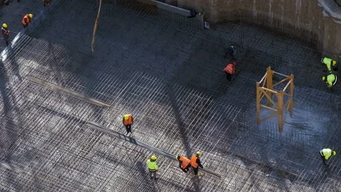 Workers lifting steel bars from reinforc... | Stock Video | Pond5