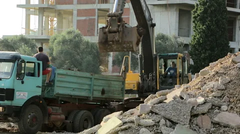 Workers loading construction materials w... | Stock Video | Pond5