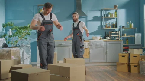 Workers of Moving Company Lose their Bal... | Stock Video | Pond5