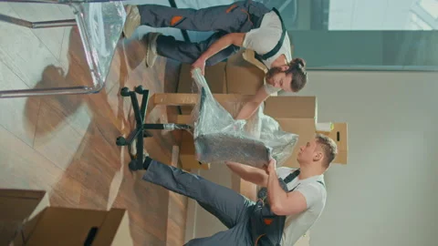 Workers of Moving Company With Uniforms ... | Stock Video | Pond5