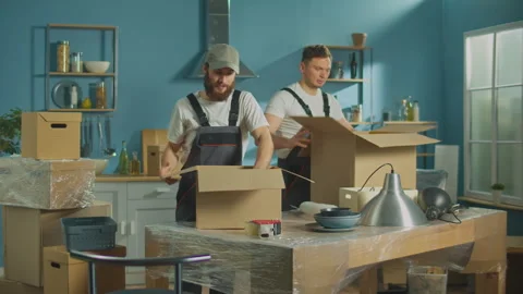 Workers of Moving Company With Uniforms ... | Stock Video | Pond5