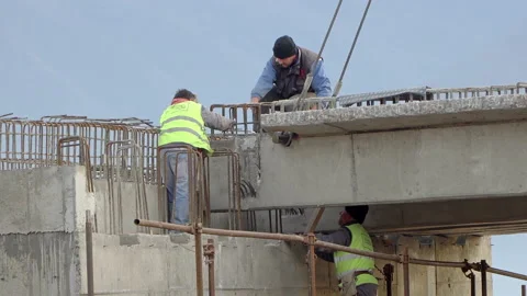 Workers on a road bridge construction si... | Stock Video | Pond5