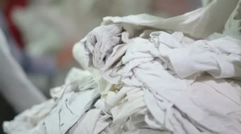 Workers segregating rags from rag pile i... | Stock Video | Pond5