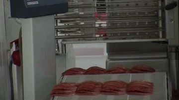 Workers sorting and packing dry meat in ... | Stock Video | Pond5