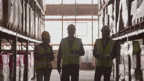 Workers Walk Together In Industrial Buil... | Stock Video | Pond5