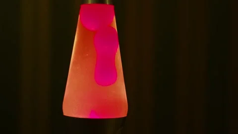working red Lava lamp on a black backgro... | Stock Video | Pond5