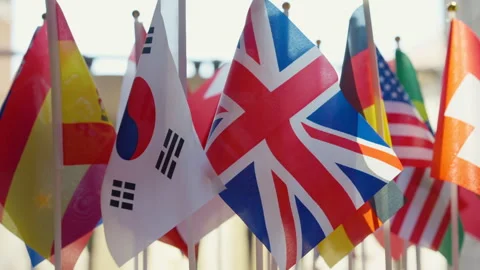 World flags fluttering in wind close-up.... | Stock Video | Pond5