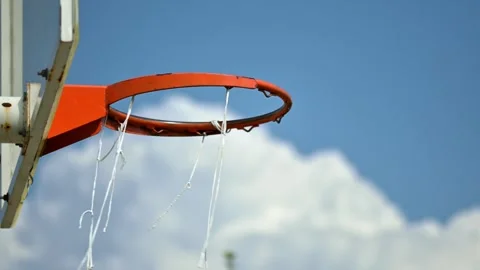 Worn out basketball hoop in the open fie... | Stock Video | Pond5