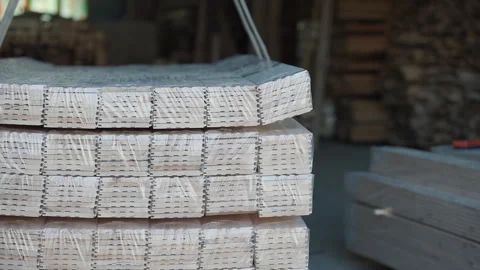 Wrapped Stack Of Lumber Planks Lifted By... | Stock Video | Pond5