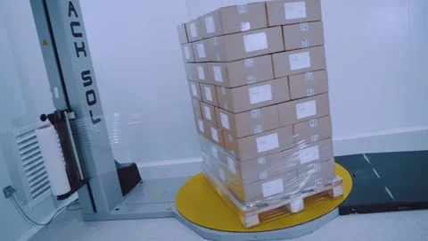 Wrapping by an automated mechanism with ... | Stock Video | Pond5