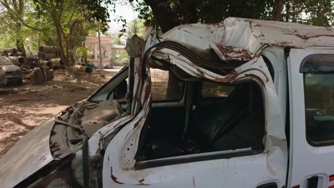 Wrecked white van with severe roof and b... | Stock Video | Pond5