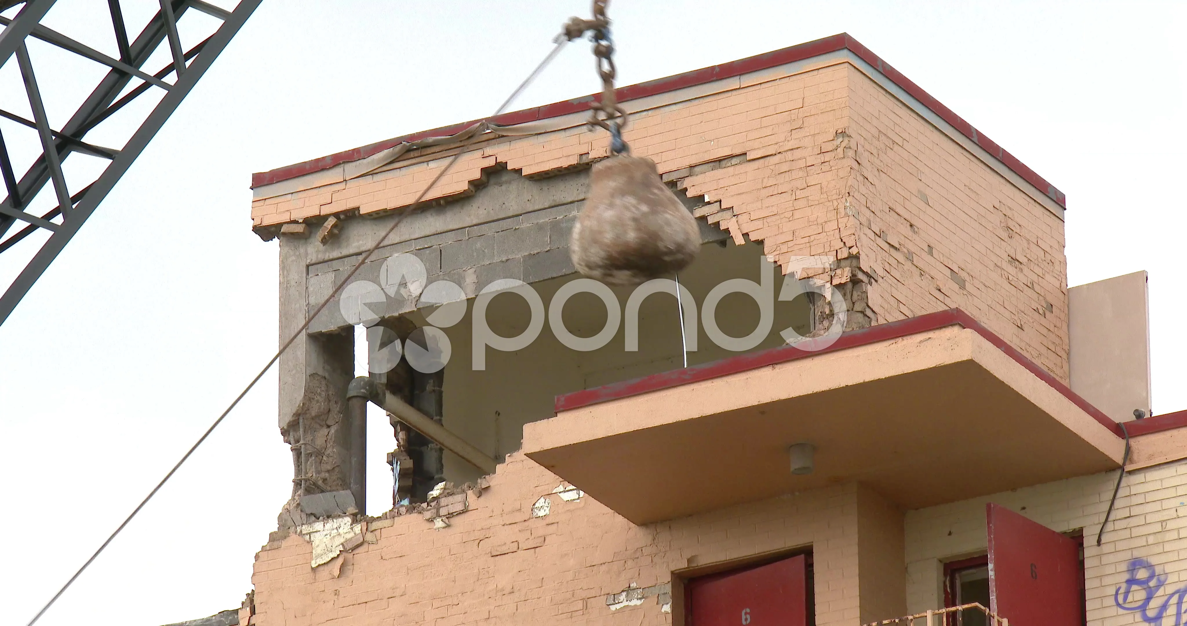 Wrecking Ball Hitting Building