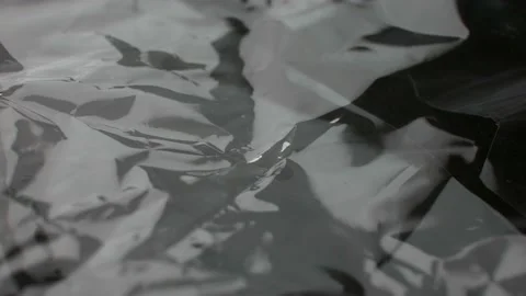 Wrinkled crumpled plastic gray texture. ... | Stock Video | Pond5