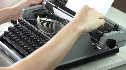 Writing a book and typing old typewriter... | Stock Video | Pond5