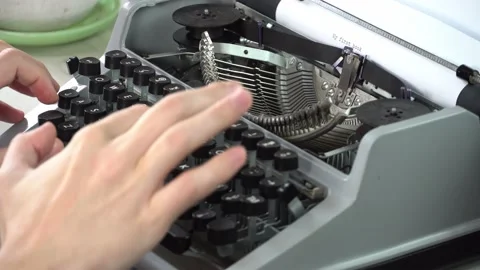 Writing a book and typing old typewriter... | Stock Video | Pond5