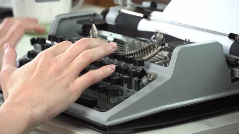 Writing a book and typing old typewriter... | Stock Video | Pond5