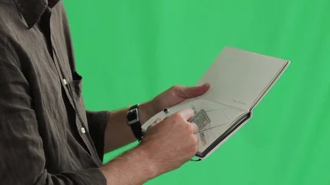 Writing on green screen notepad | Stock Video | Pond5