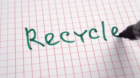 Writing the word RECYCLE in a green felt... | Stock Video | Pond5